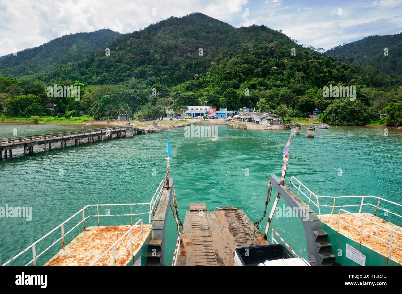 Ferry ramp, turquoise tropical sea and ferry pier on tropical Koh Chang ...