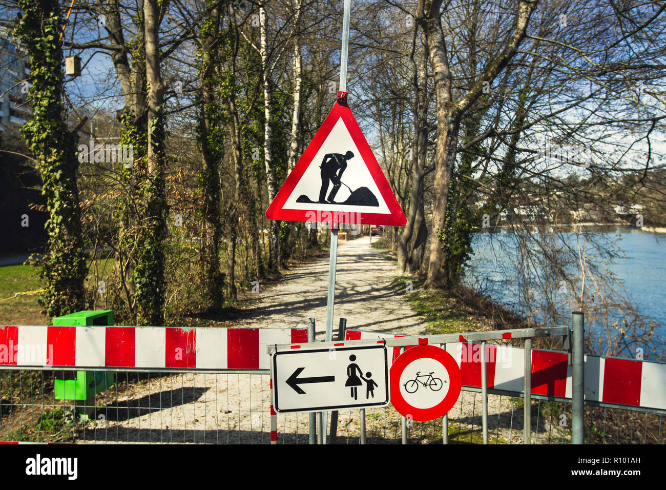 Sign road repair, bypass on the other side Stock Photo - Alamy