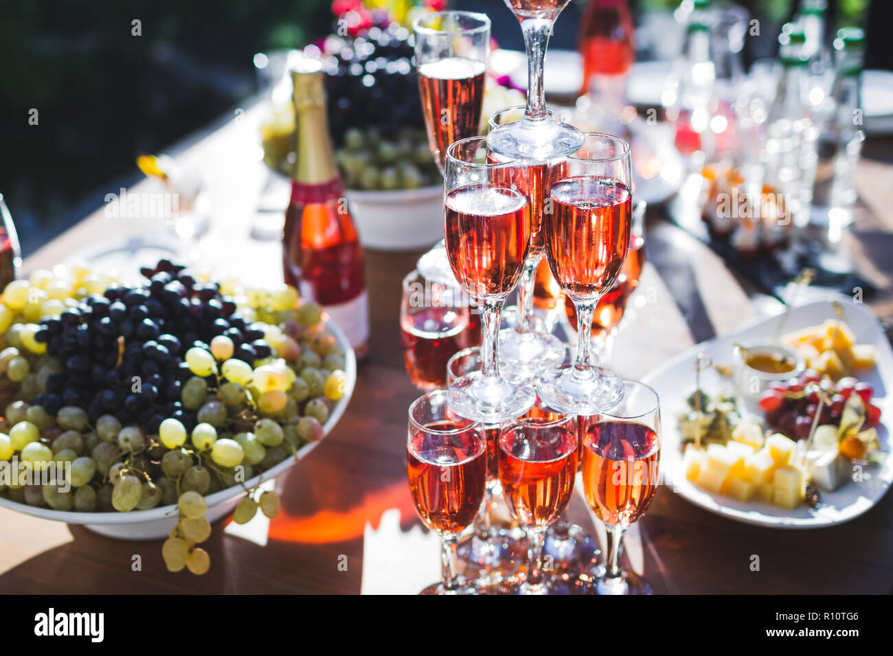 Stack of glasses of champagne at the reception in the open air Stock ...