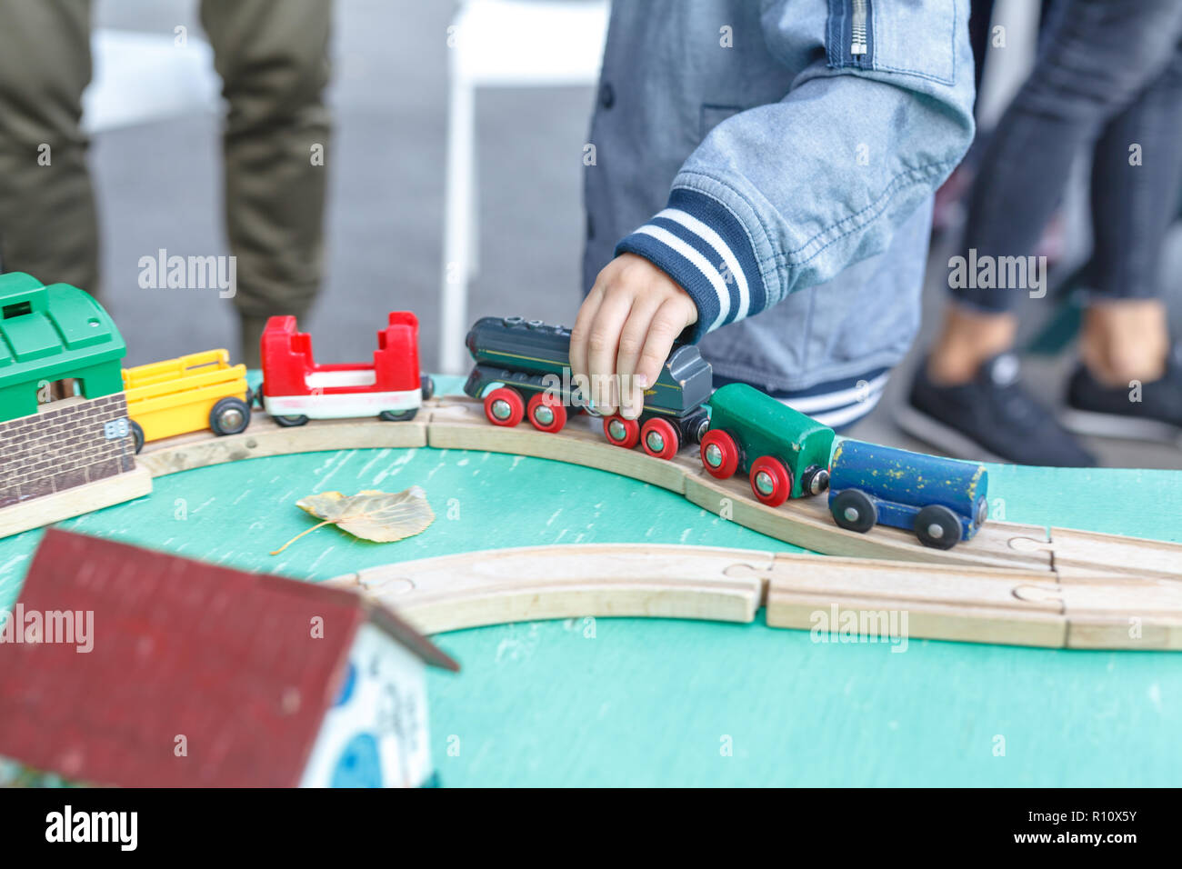 kids playing with toy railway road outdoor Stock Photo - Alamy