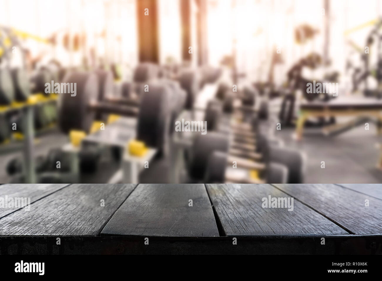 Empty table montage with blur fitness gym room on background Stock ...