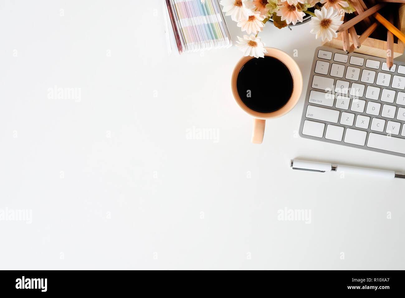 Top view artist workplace with computer, coffee and office supplies ...
