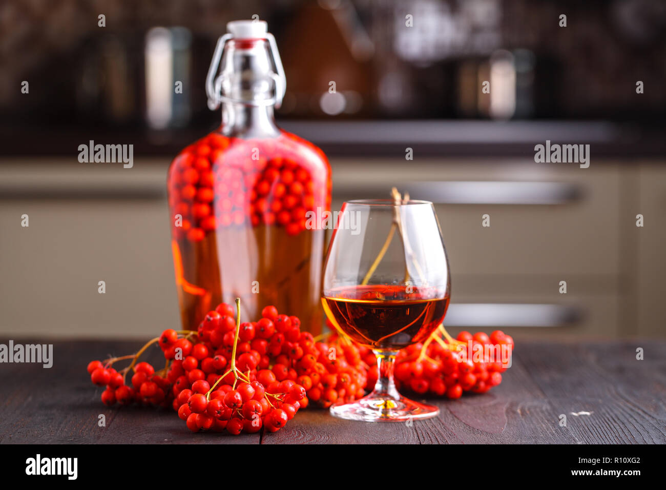 Autumn berry alcohol drink, selfmade home Stock Photo - Alamy