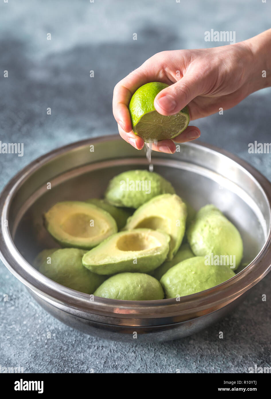 Squeezing fresh green lime hi-res stock photography and images - Alamy