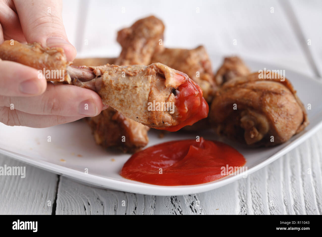 senior man eating fried chicken leg Stock Photo - Alamy