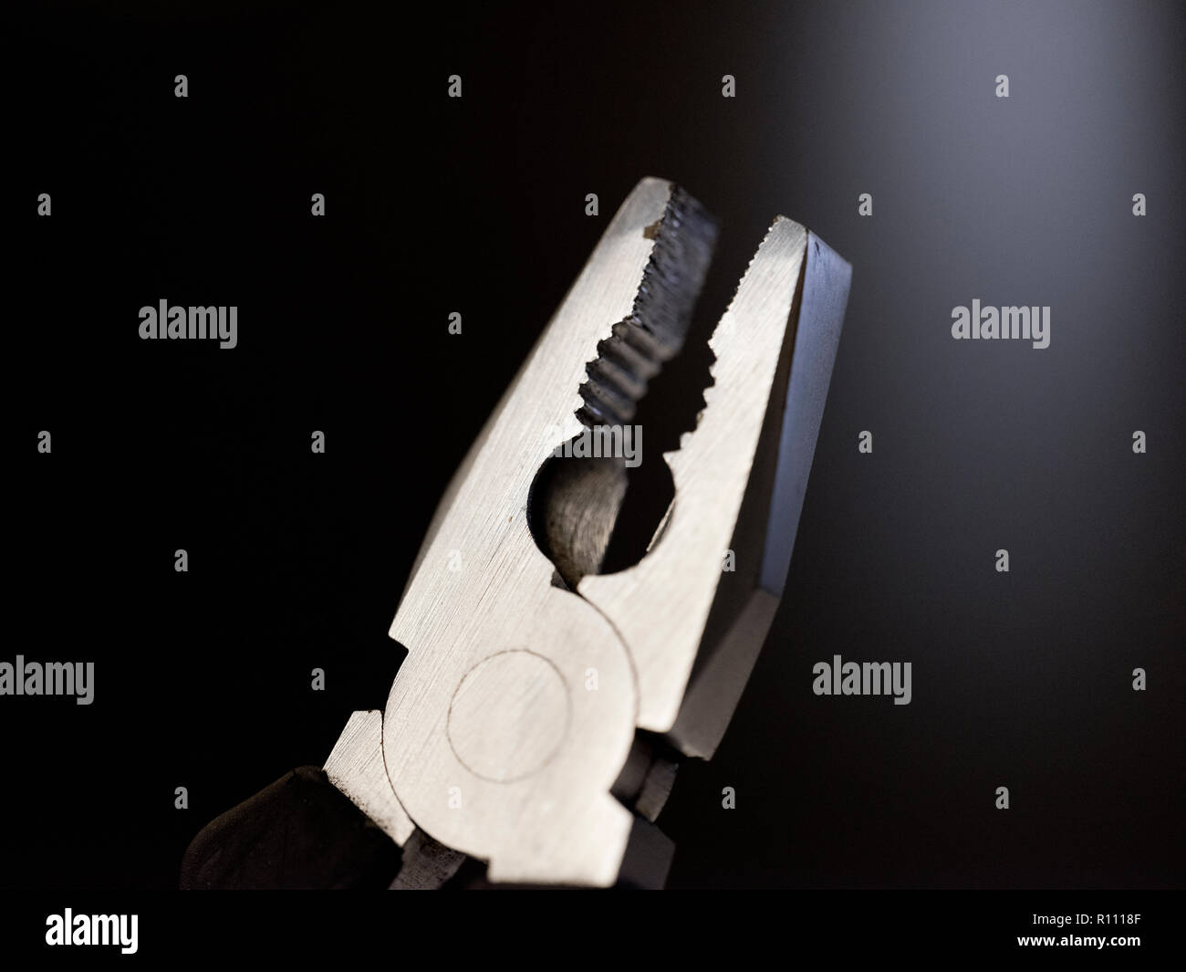 Pliers, isolated in a studio setting Stock Photo - Alamy