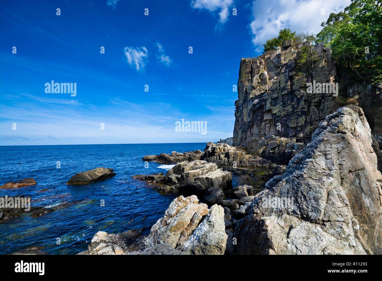 Sheer cliffs of the northern coast of Bornholm island ...