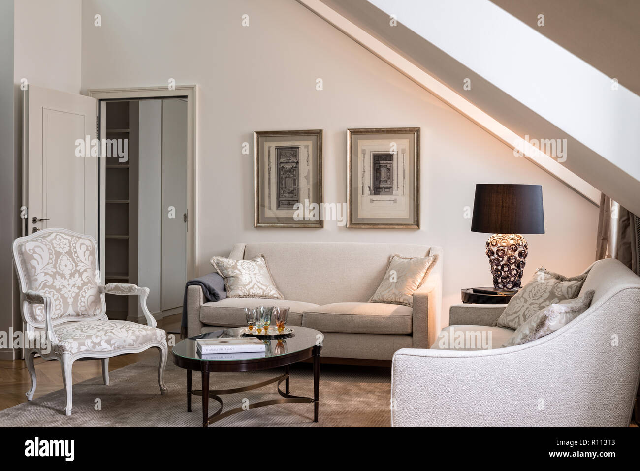 Living room with gabled ceiling Stock Photo - Alamy