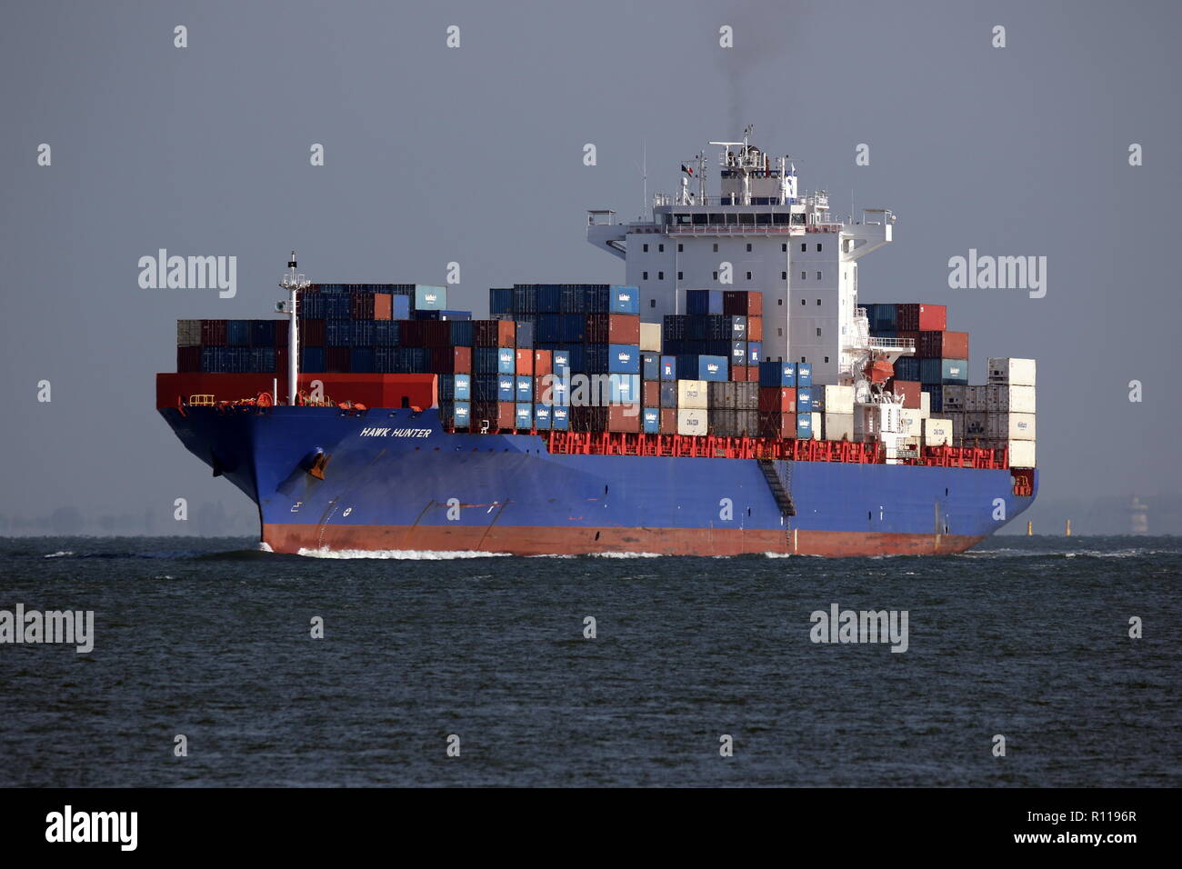 The container ship Hawk Hunter passes on 19 October 2018 Terneuzen and ...