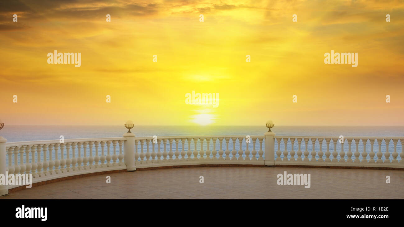 a beautiful promenade and the sunrise over the sea Stock Photo - Alamy