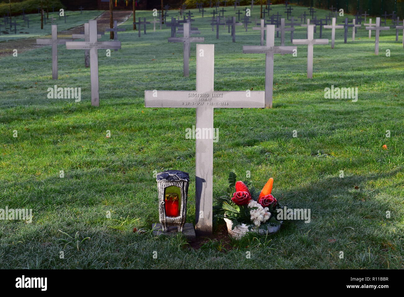 A grave marker 30.Nov.1944, adorned with flowers at his last resting ...