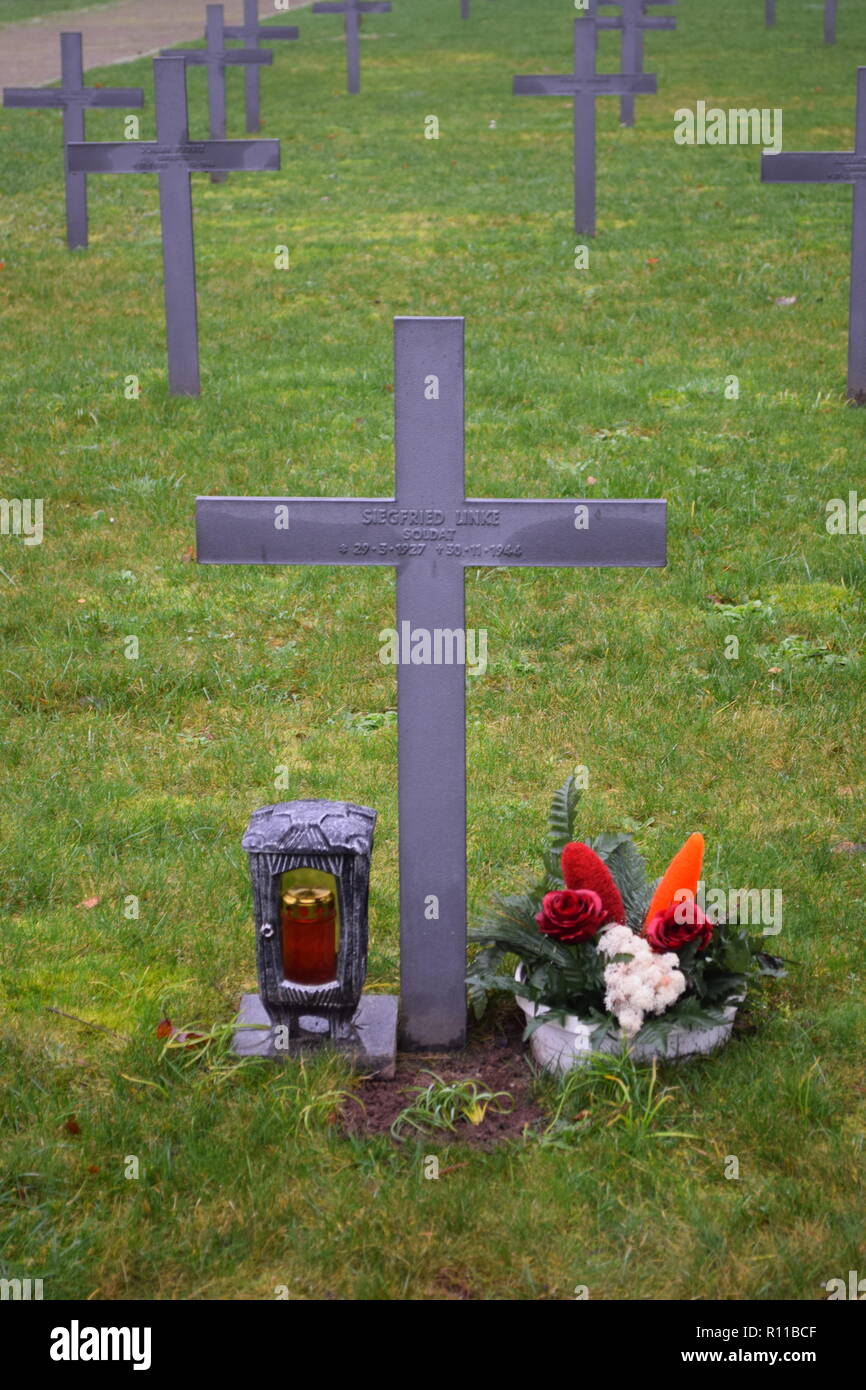 A grave marker 30.Nov.1944, adorned with flowers at his last resting ...