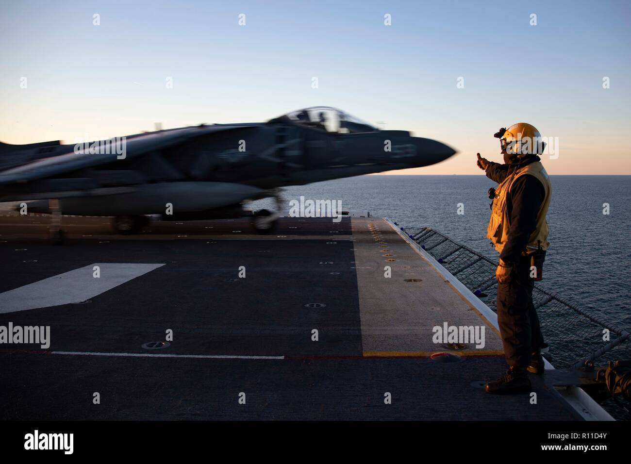 A U.S. Marine Corps AV-8B Harrier fighter jet, takes off from the ...