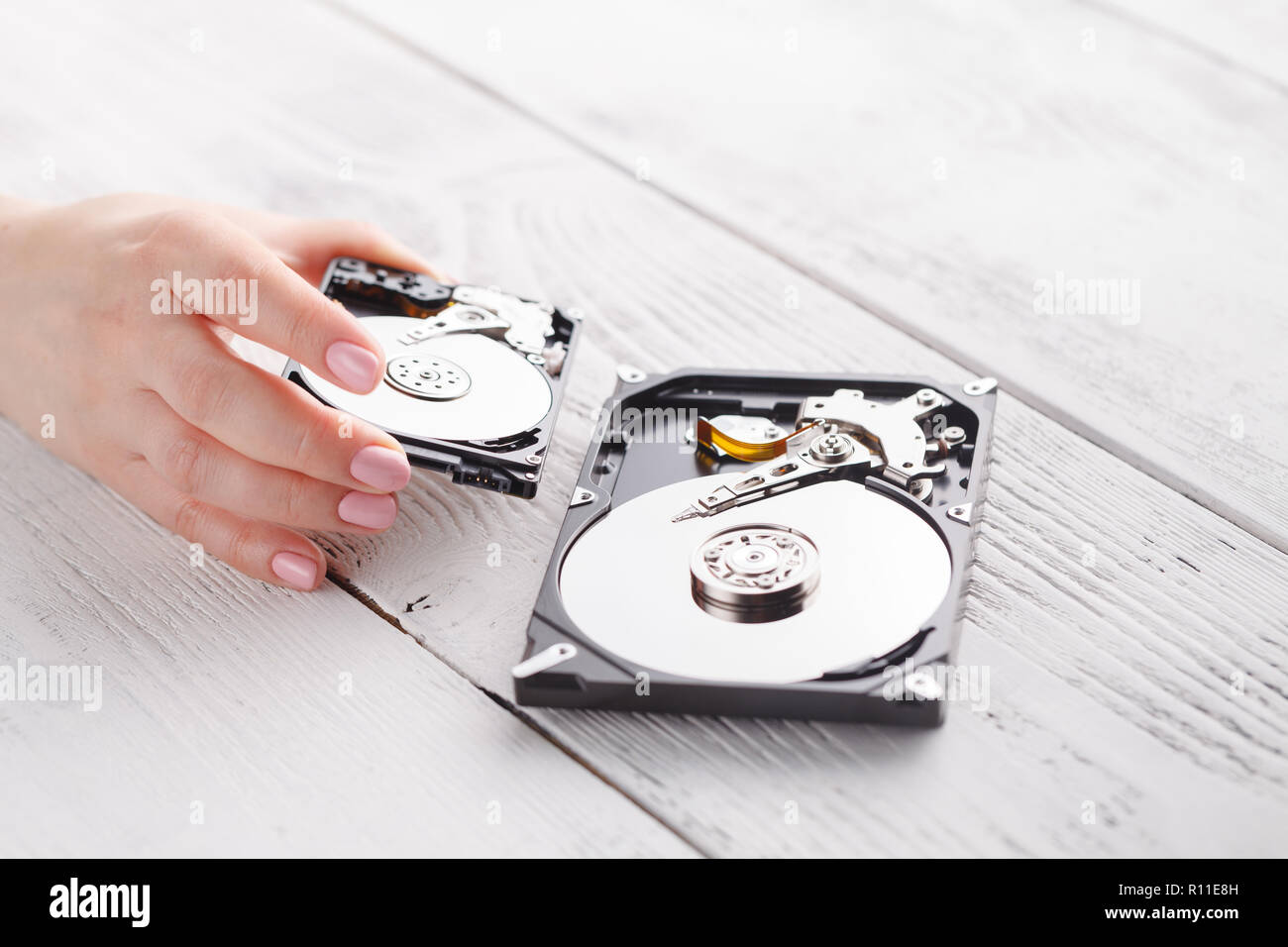 Open hard drive in hand hi-res stock photography and images - Alamy