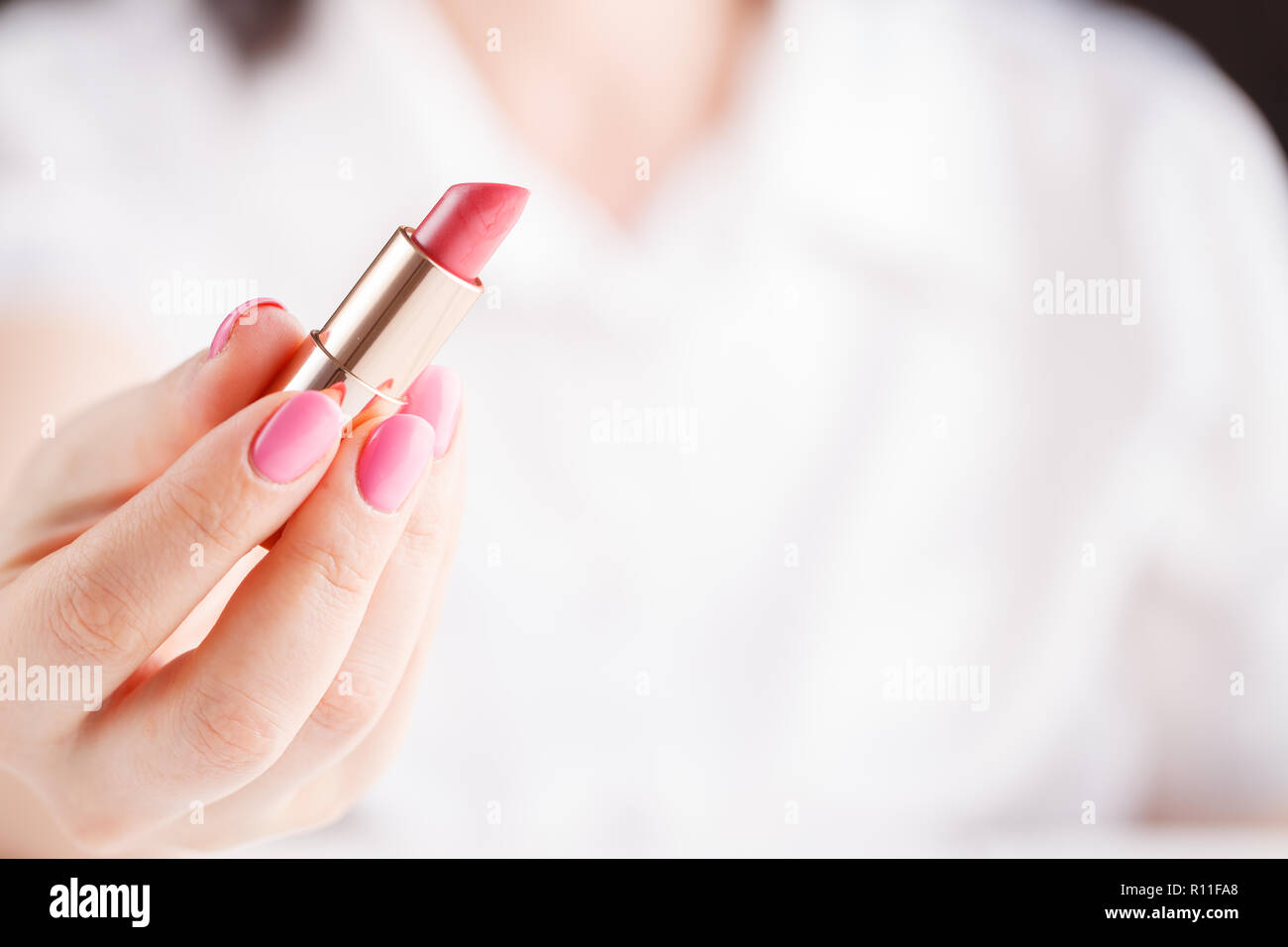 Female handle a lipstick on hand Stock Photo - Alamy