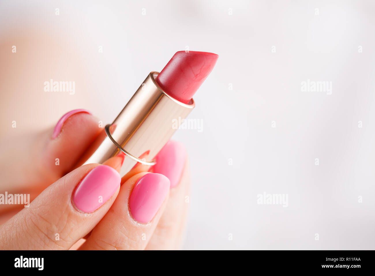 Female handle a lipstick on hand Stock Photo - Alamy