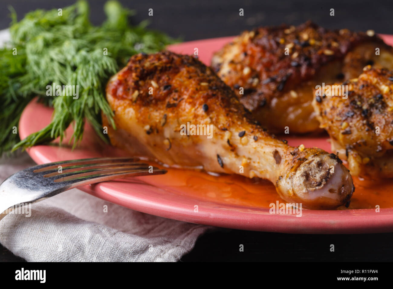 Roasted chicken legs with french mustard Stock Photo - Alamy