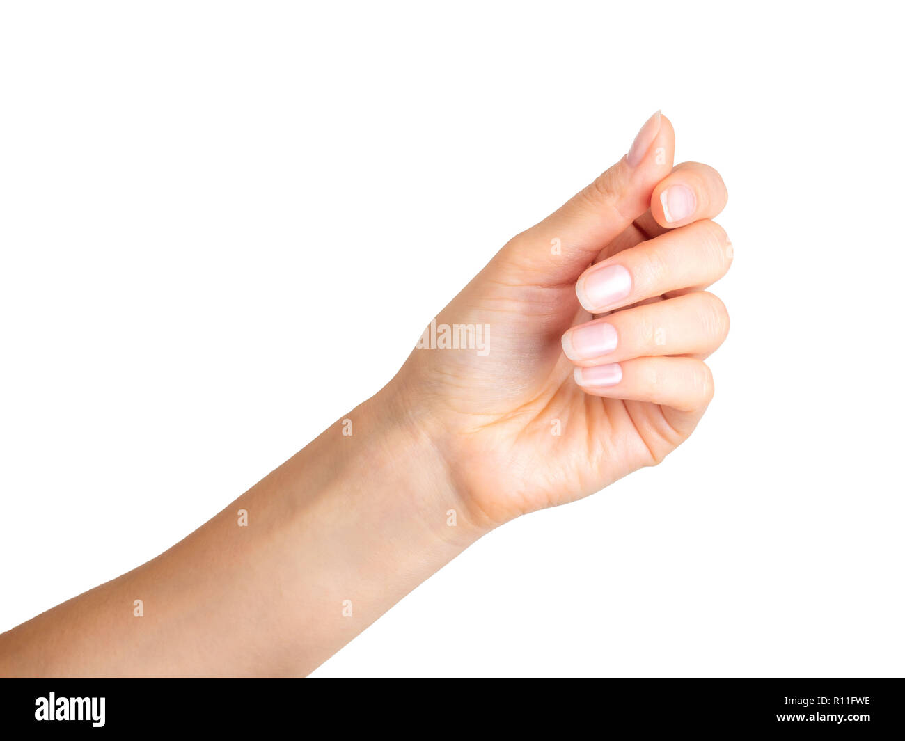 Woman hand holding something with three fingers Stock Photo - Alamy