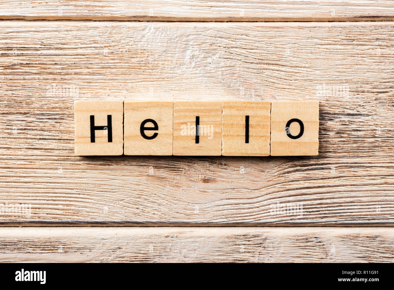 hello word written on wood block. hello text on table, concept Stock ...