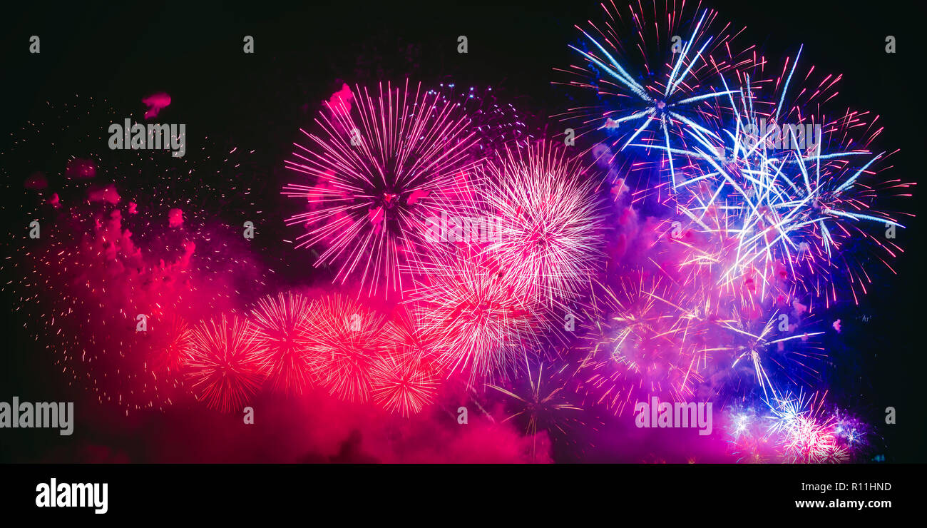 Colorful fireworks explosion on the black background Stock Photo - Alamy
