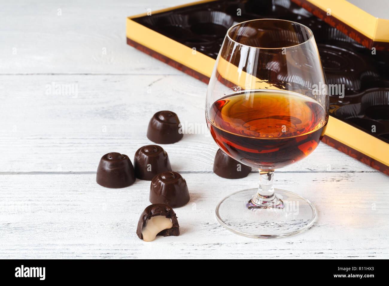 Chocolate candies with brandy Stock Photo - Alamy