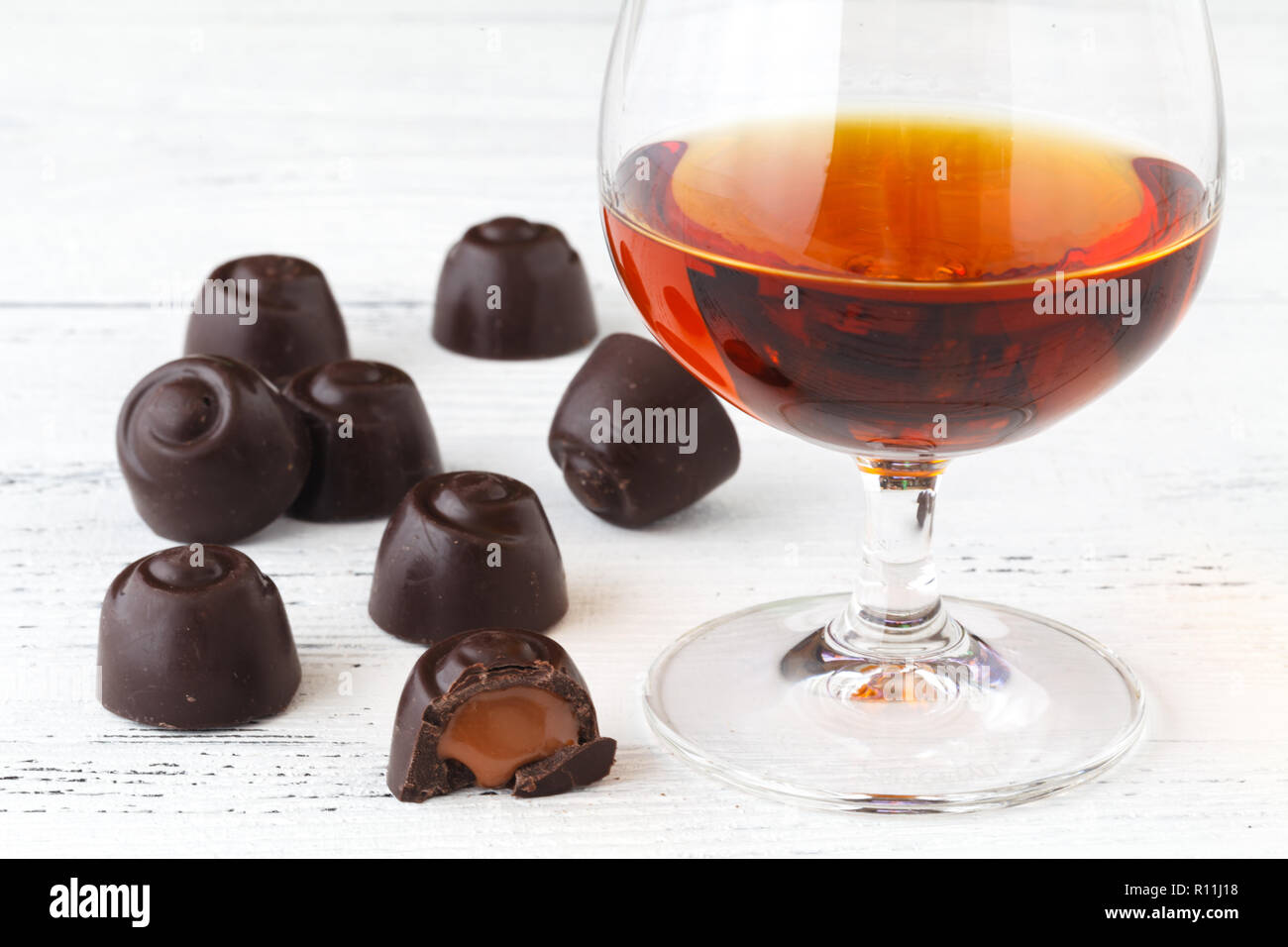 Chocolate candies with brandy Stock Photo - Alamy