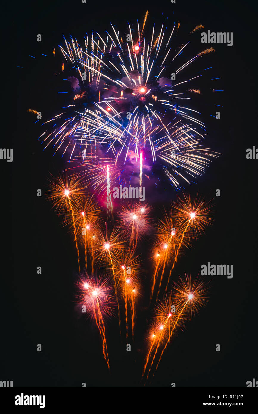 Colorful fireworks explosion on the black background Stock Photo - Alamy