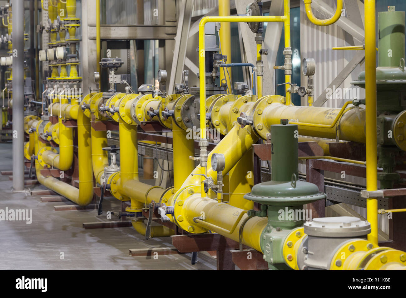 Yellow gas tube with sensors in room Stock Photo - Alamy