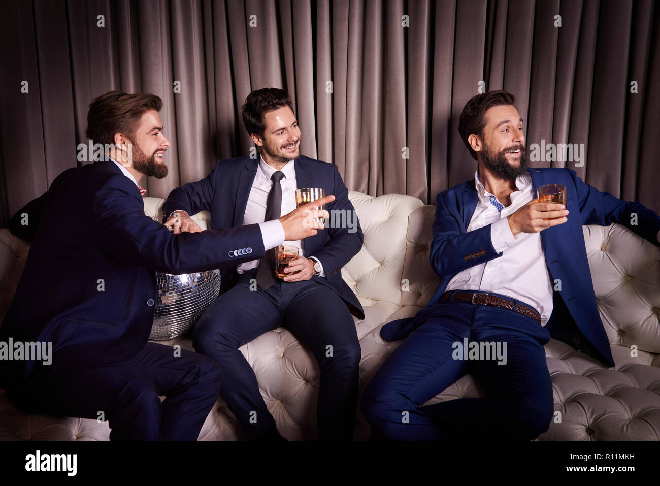 Male friends at the party Stock Photo - Alamy