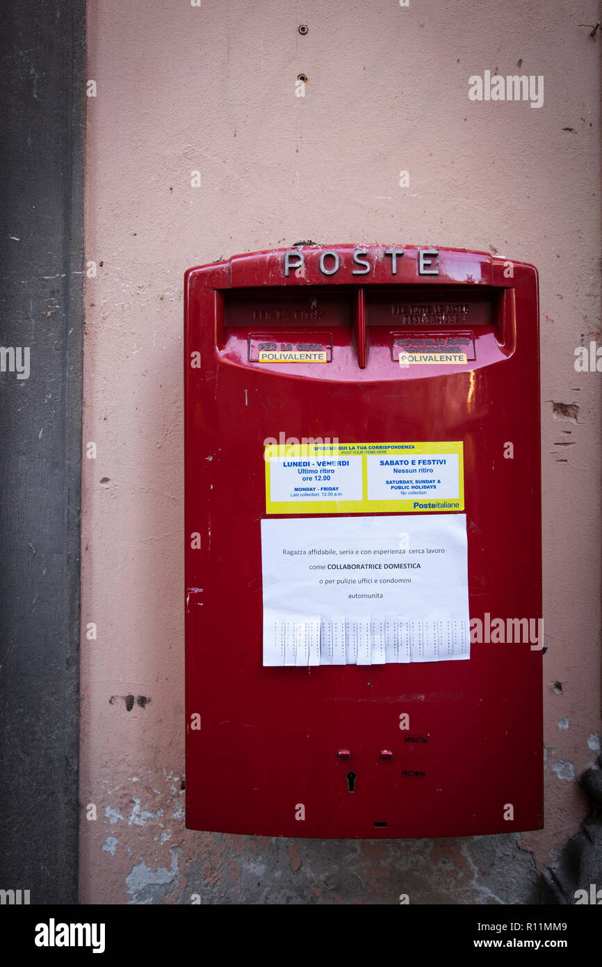 Red Italian wall mounted post box Stock Photo - Alamy