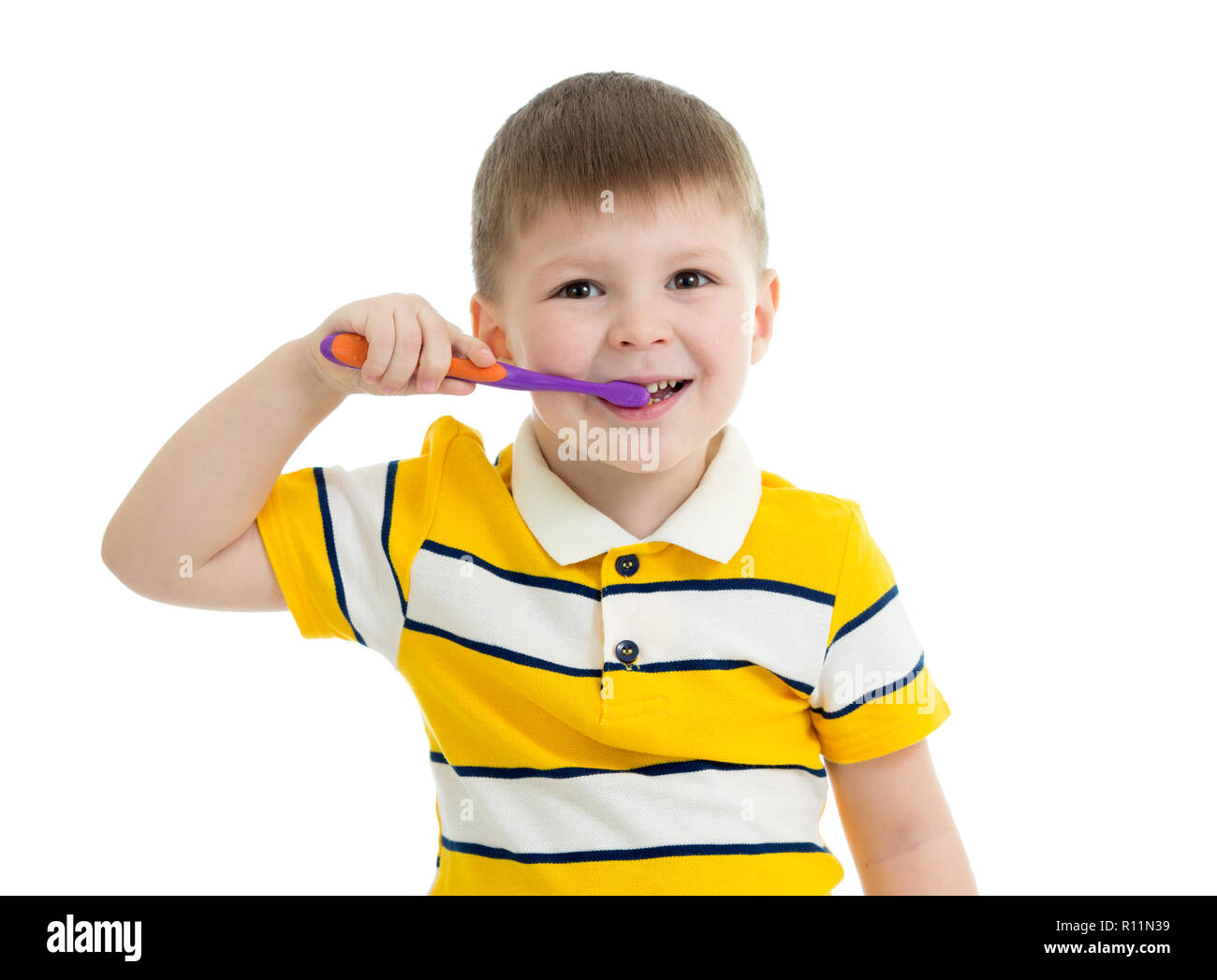 Cute little child boy brushing teeth, isolated on white Stock Photo - Alamy