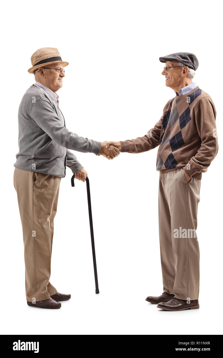 Two old men shaking hands Cut Out Stock Images & Pictures - Alamy