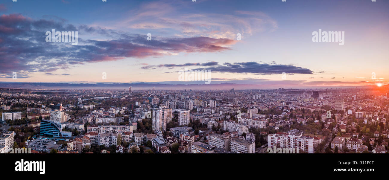 Beautiful drone shot over the city of Sofia at sunrise - amazing vivid ...
