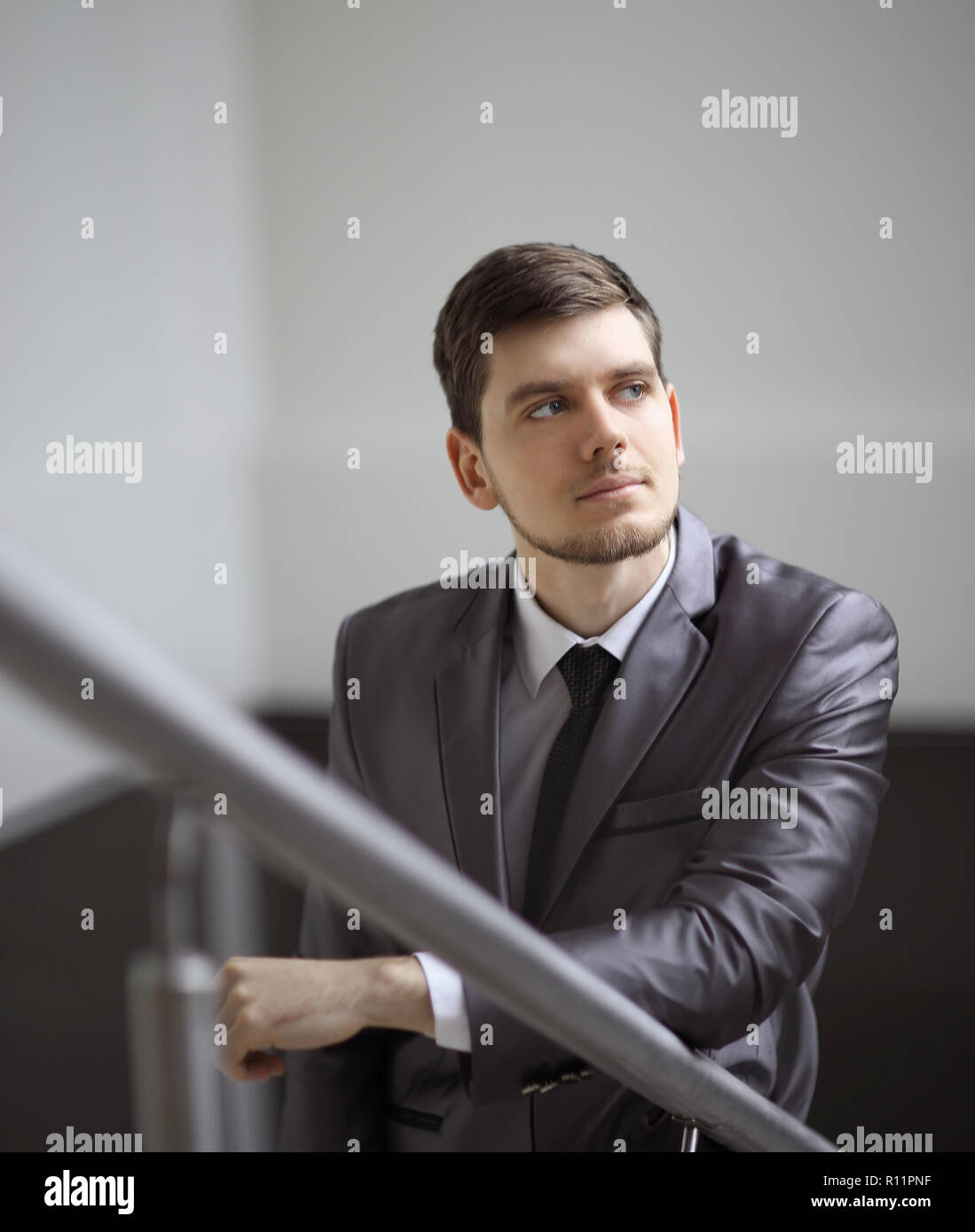 close up.thoughtful businessman looking out the office window Stock ...