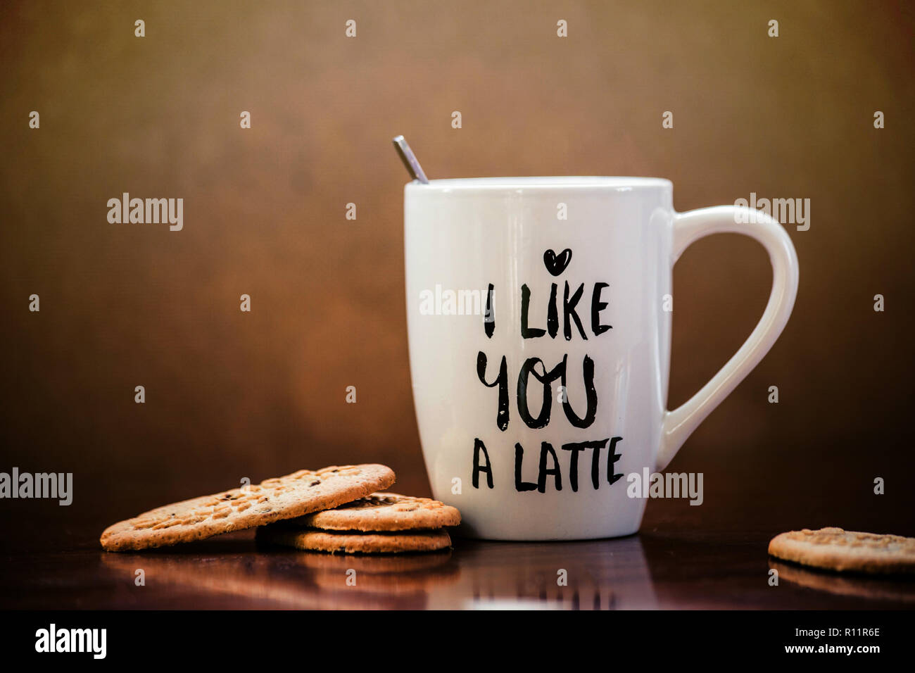 Coffee latte and cookies with white mug and the text i like you a latte ...