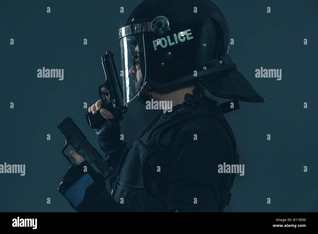 Protection, riot police signaling to colleagues with their hands. armed ...