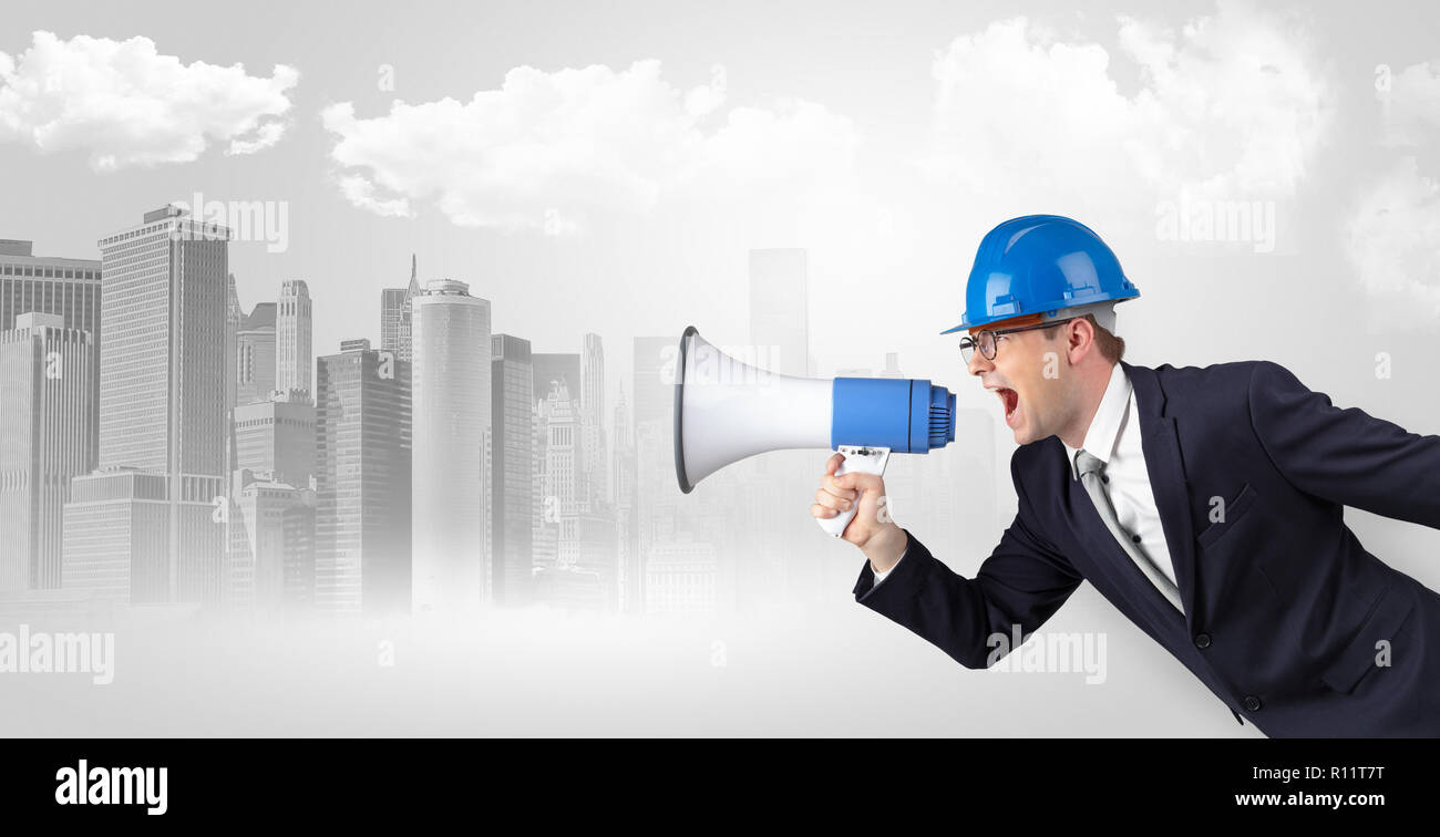 Young supervisor architect yelling to far big city panorama Stock Photo ...