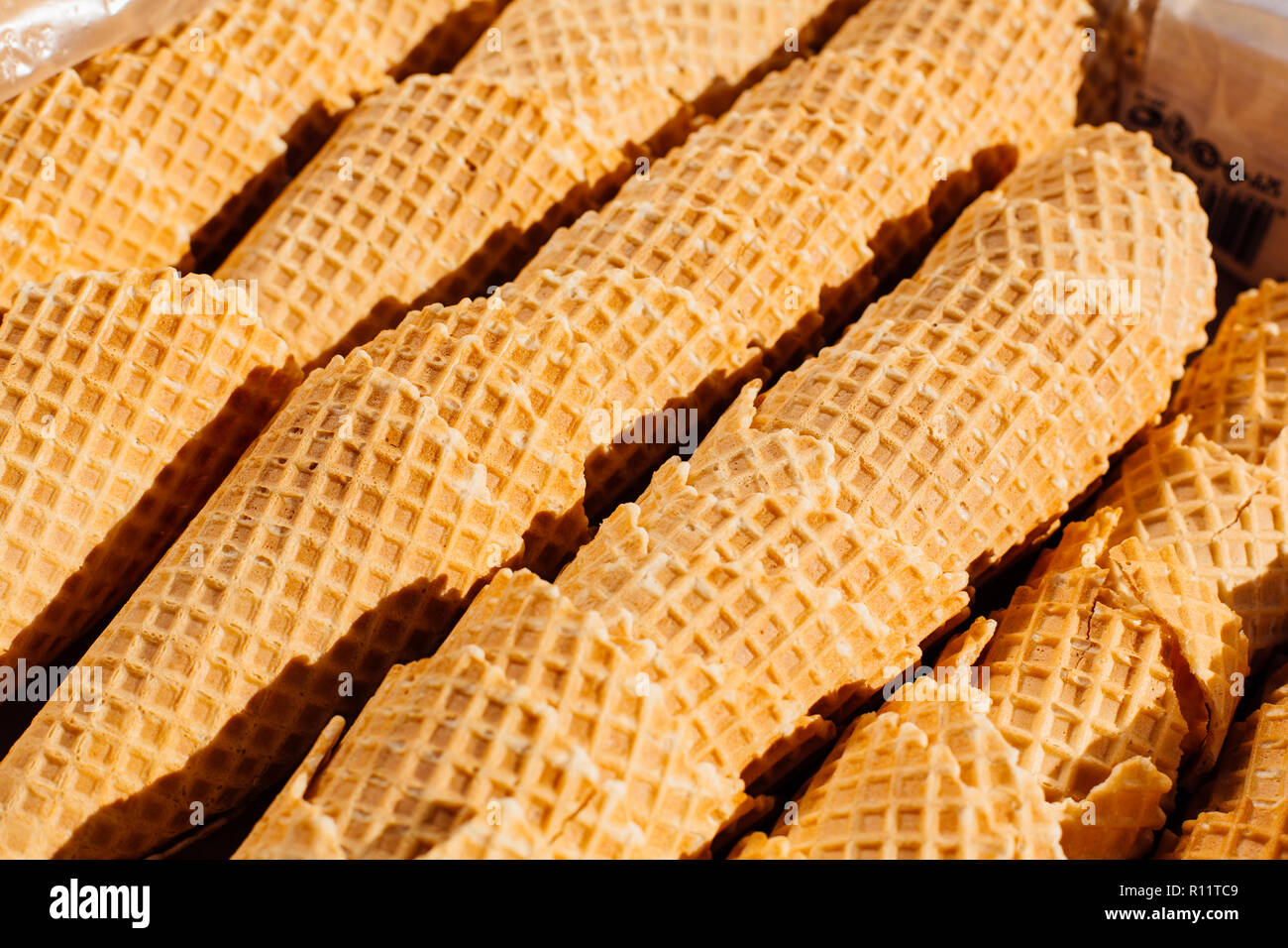 Waffle cones for ice cream background Stock Photo - Alamy