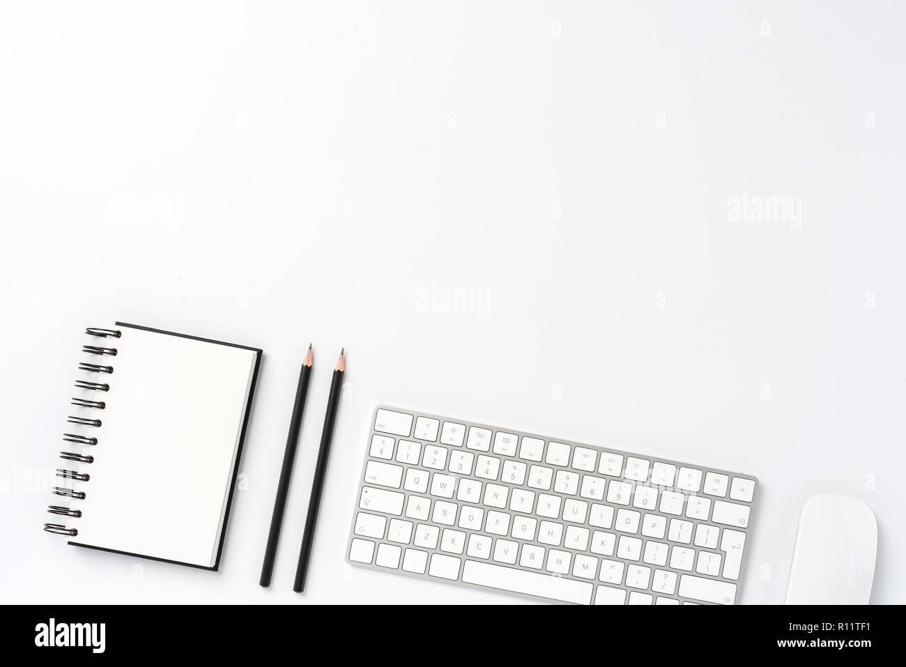 Overhead shot of office desktop Stock Photo - Alamy