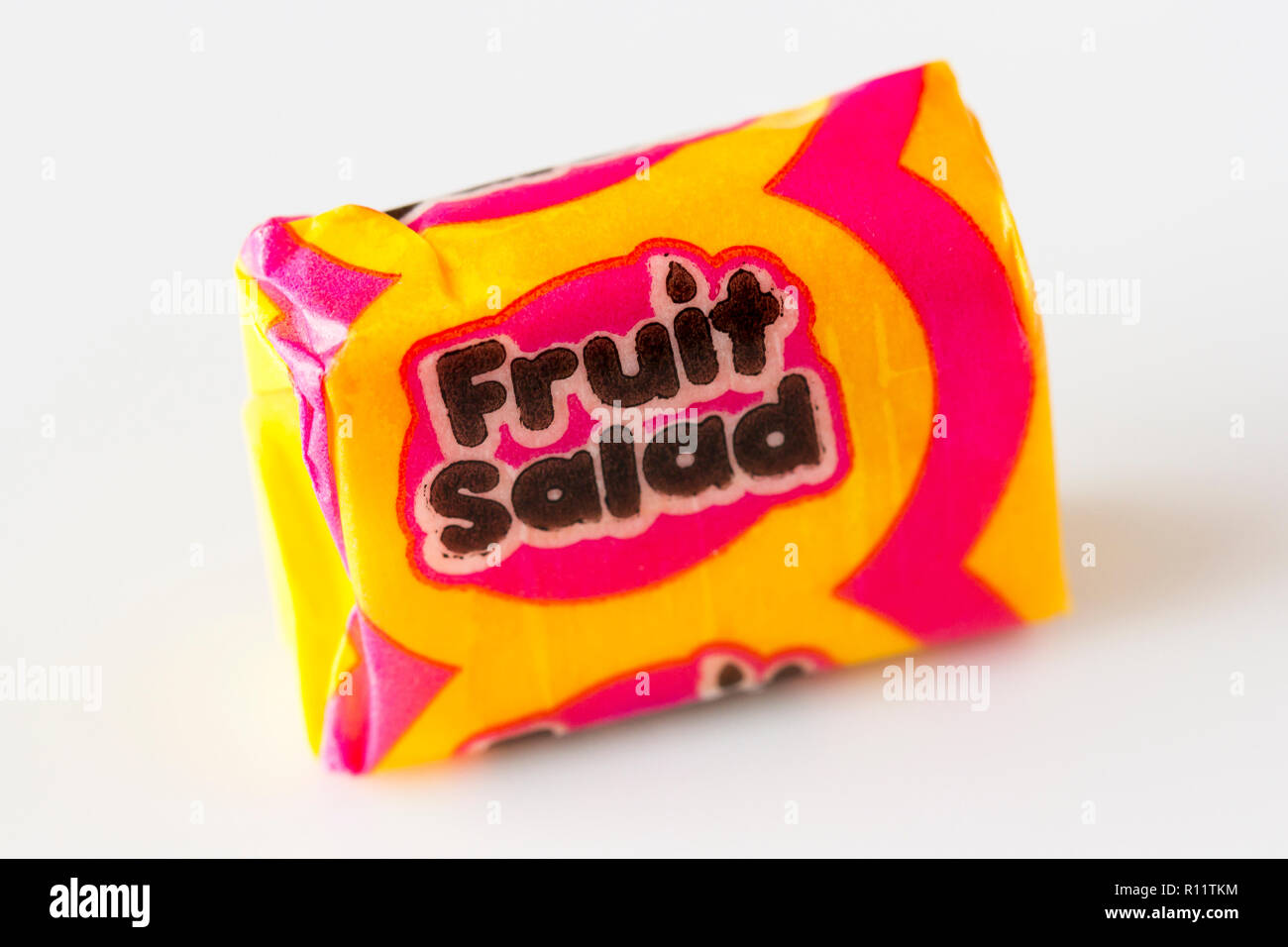 Fruit salad sweet, wrapped, retro sweet, closeup Stock Photo - Alamy