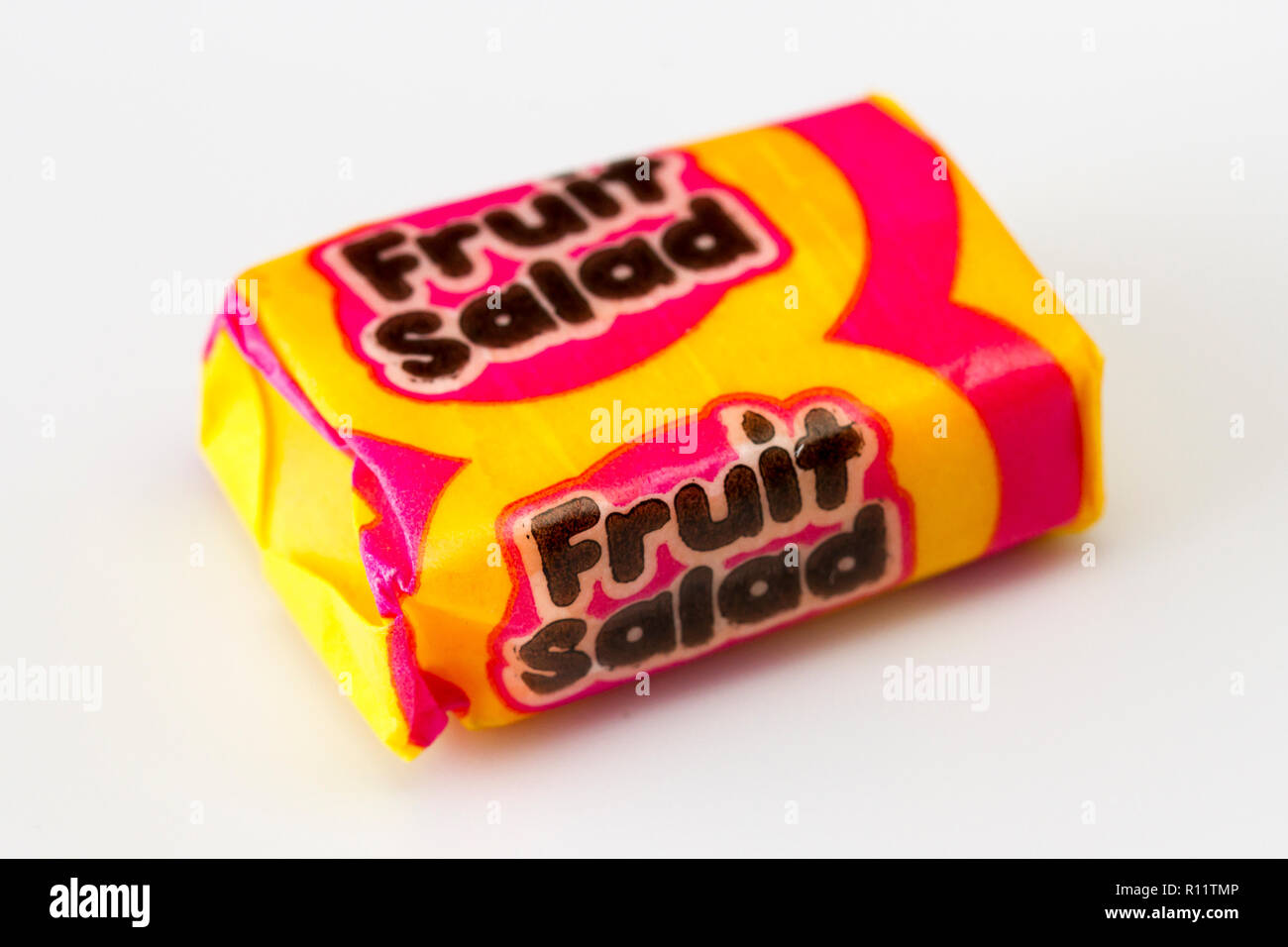 Fruit salad sweet, wrapped, retro sweet, closeup Stock Photo - Alamy