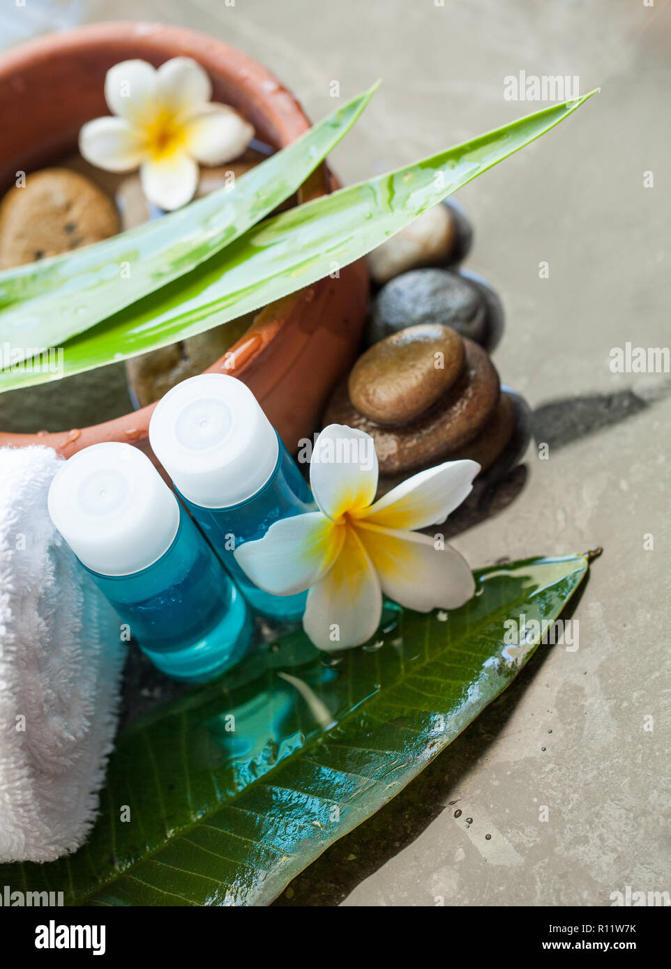 spa objects for massage treatment on dark background Stock Photo - Alamy