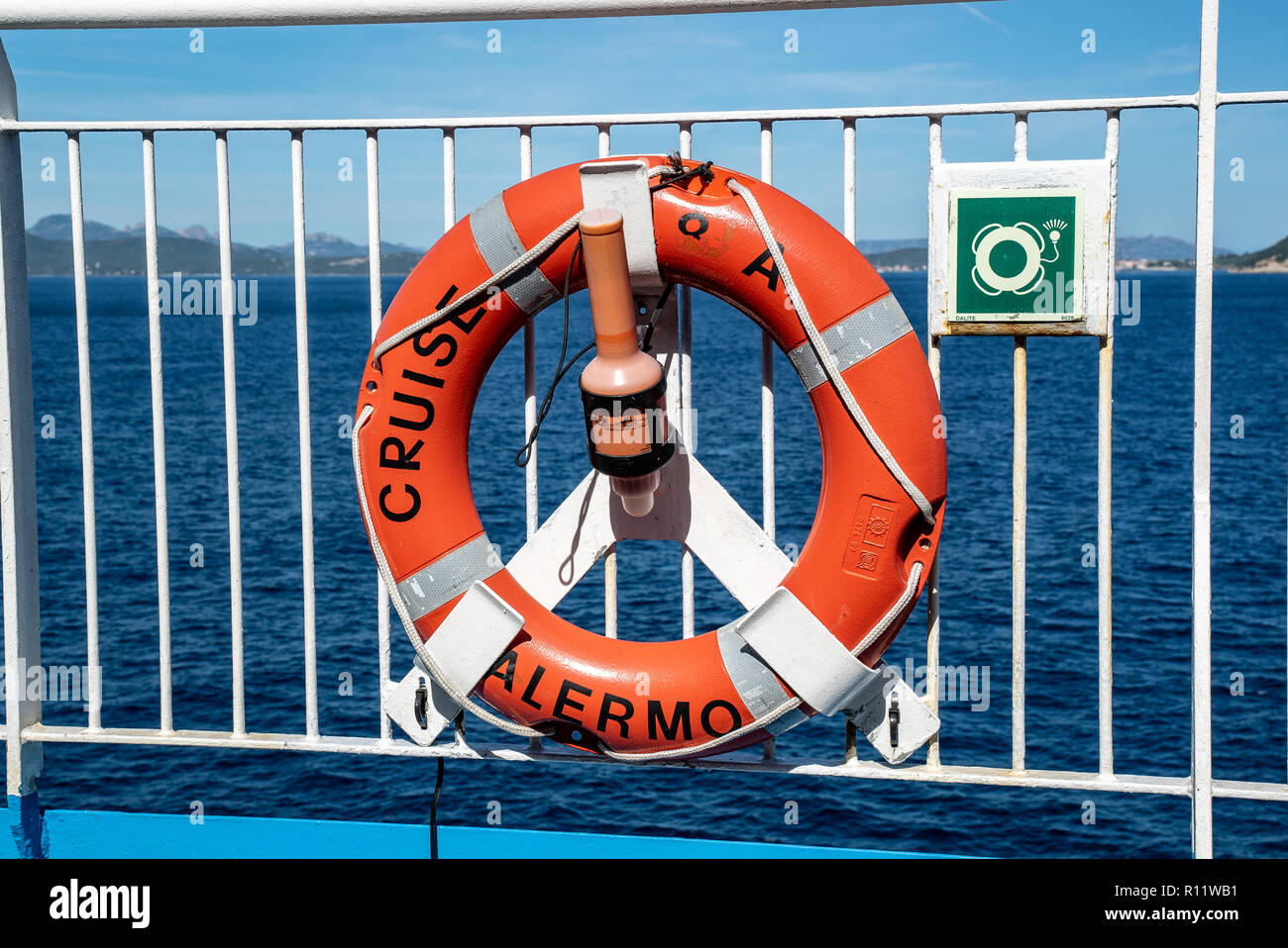 lifebuoy on a ship blue sky and ocean in background Stock Photo - Alamy