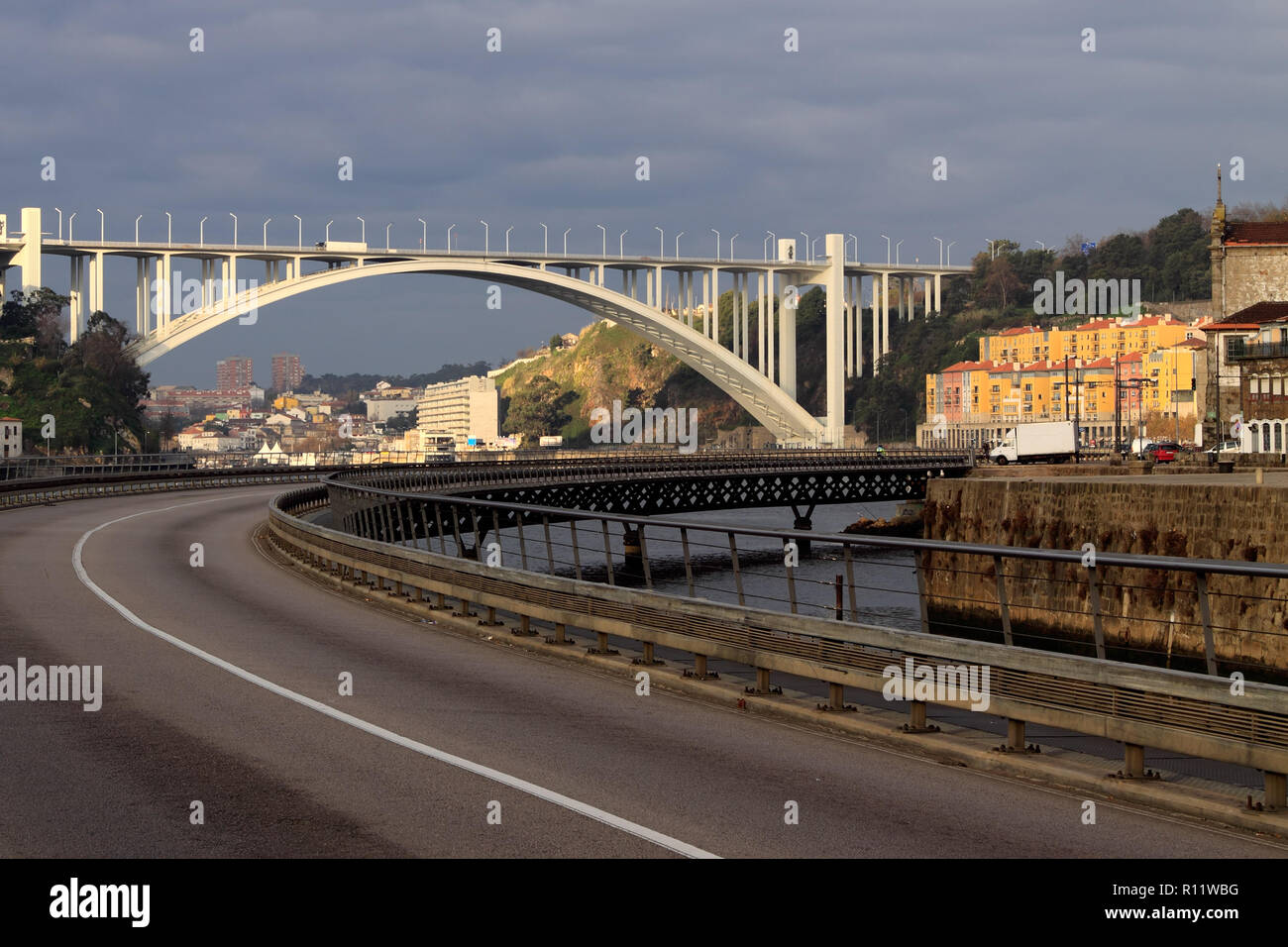 Interesting view of the concrete bridge of Arrabida in Porto, Portugal ...