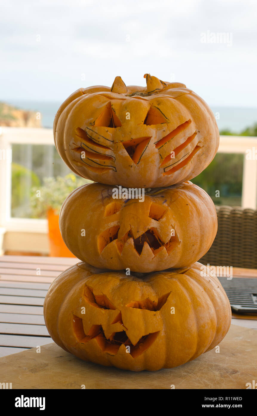 Carved pumpkin faces hi-res stock photography and images - Alamy