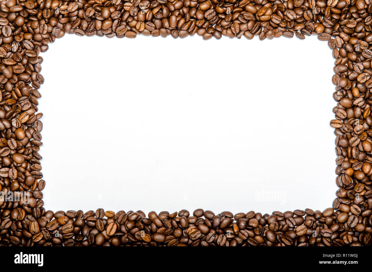 a frame built from coffee beans, white background Stock Photo - Alamy