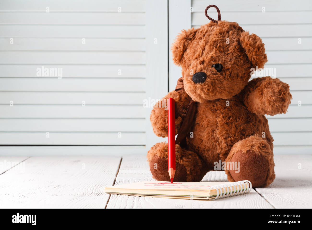 Study math with teddy bear Stock Photo - Alamy
