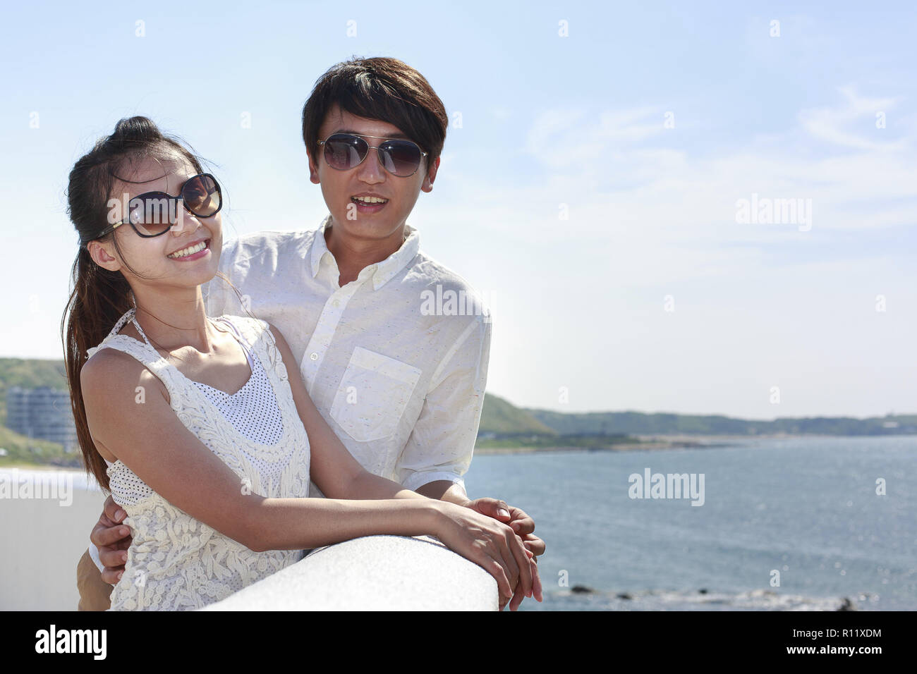 couple by the sea Stock Photo - Alamy