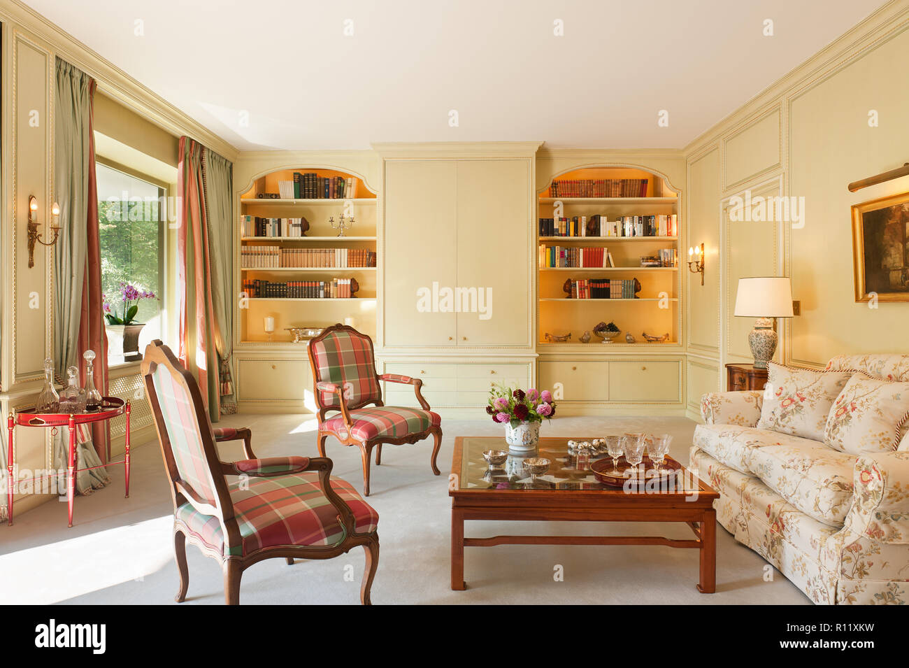 Edwardian living room with built in shelving Stock Photo - Alamy