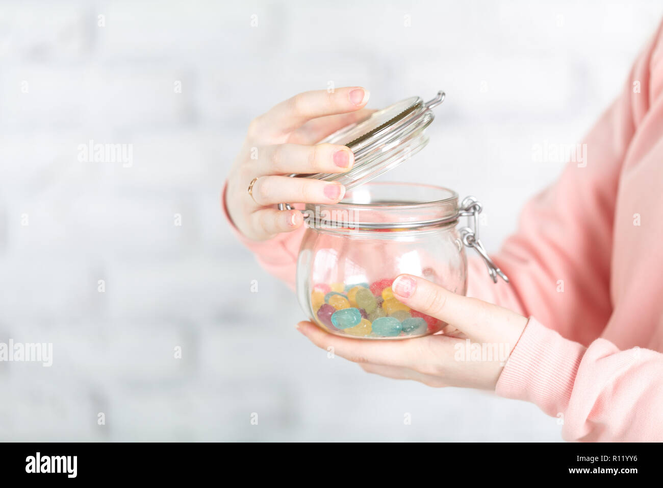 Female holg glass jar with jelly Stock Photo - Alamy